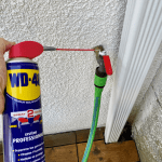 Het beroemde WD-40 Multi-Use Product met Smart Straw spuitsysteem